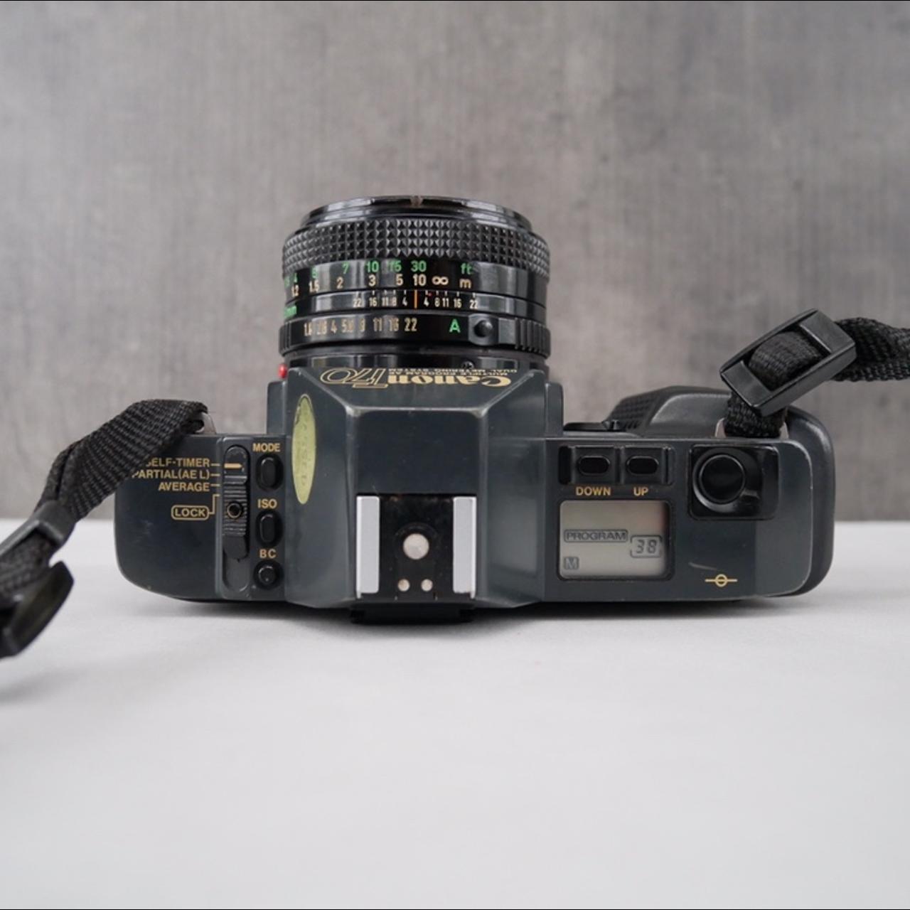 CANON T70 35mm FILM CAMERA. Tested 👌🏻 Specs: 50mm... - Depop