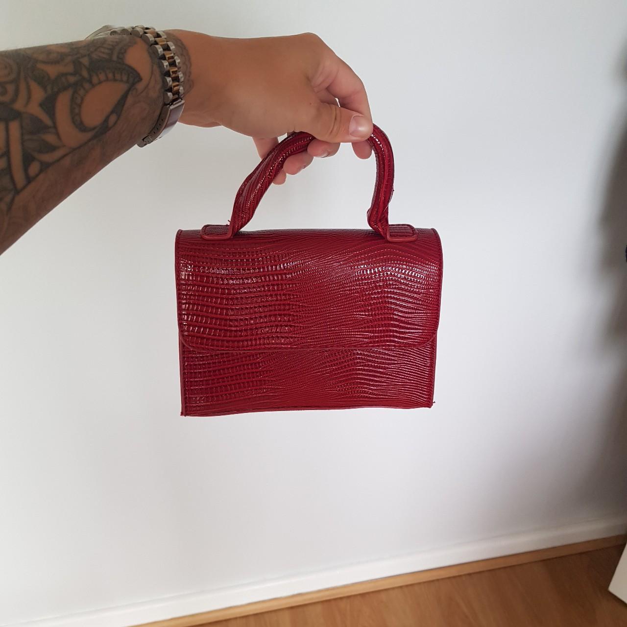 Red mini bag with adjustable strap. Perfect... - Depop