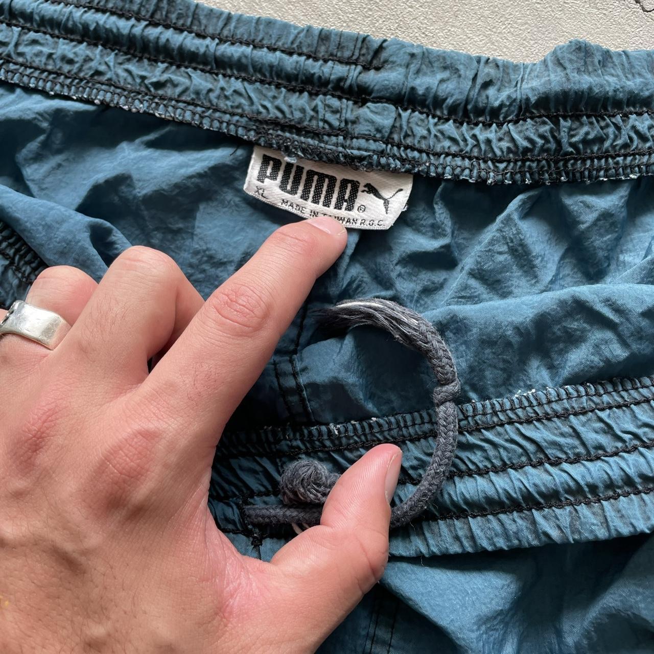 Super clean vintage 1990s Puma nylon shorts. Has a... - Depop