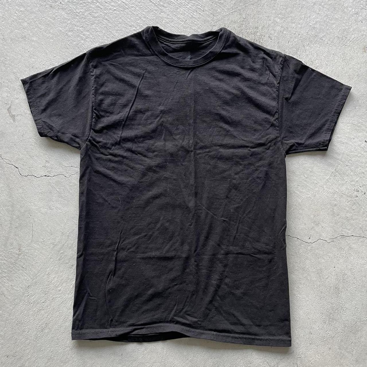 Clean blank black tee. Tagged a M and measures at... - Depop