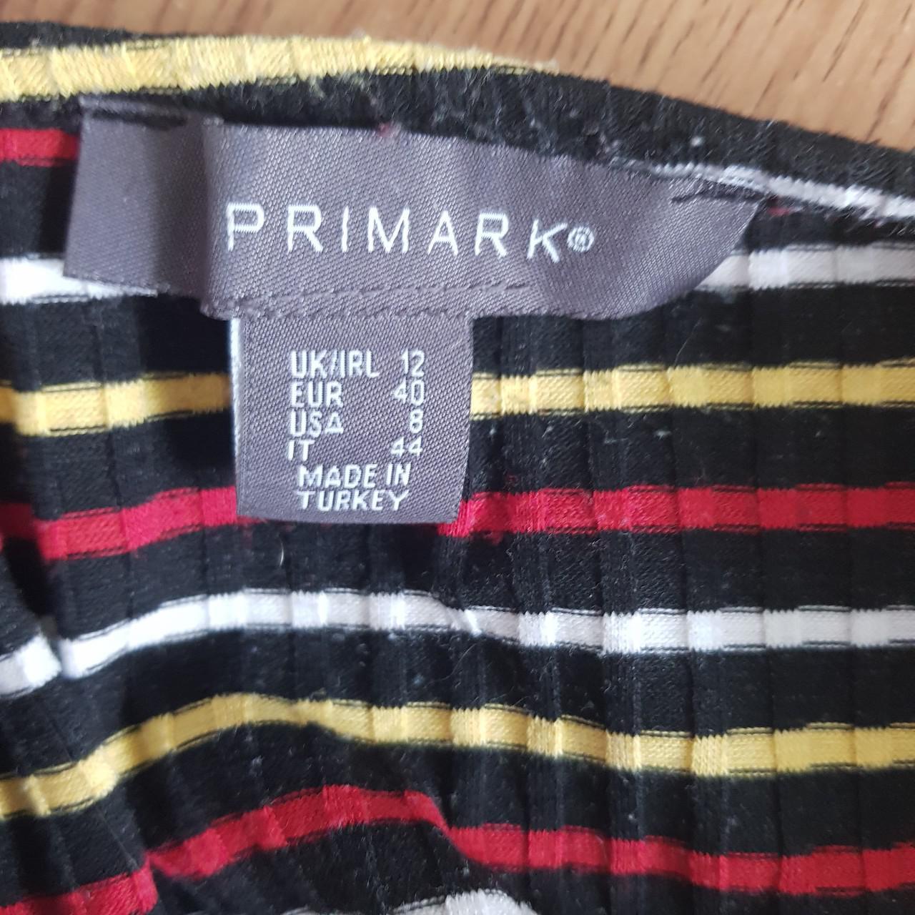 Primark black ribbed crop top with red, white and... - Depop