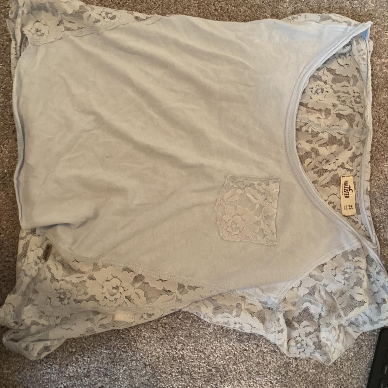 Holister floral blue baggy top with lace back Hardly... - Depop