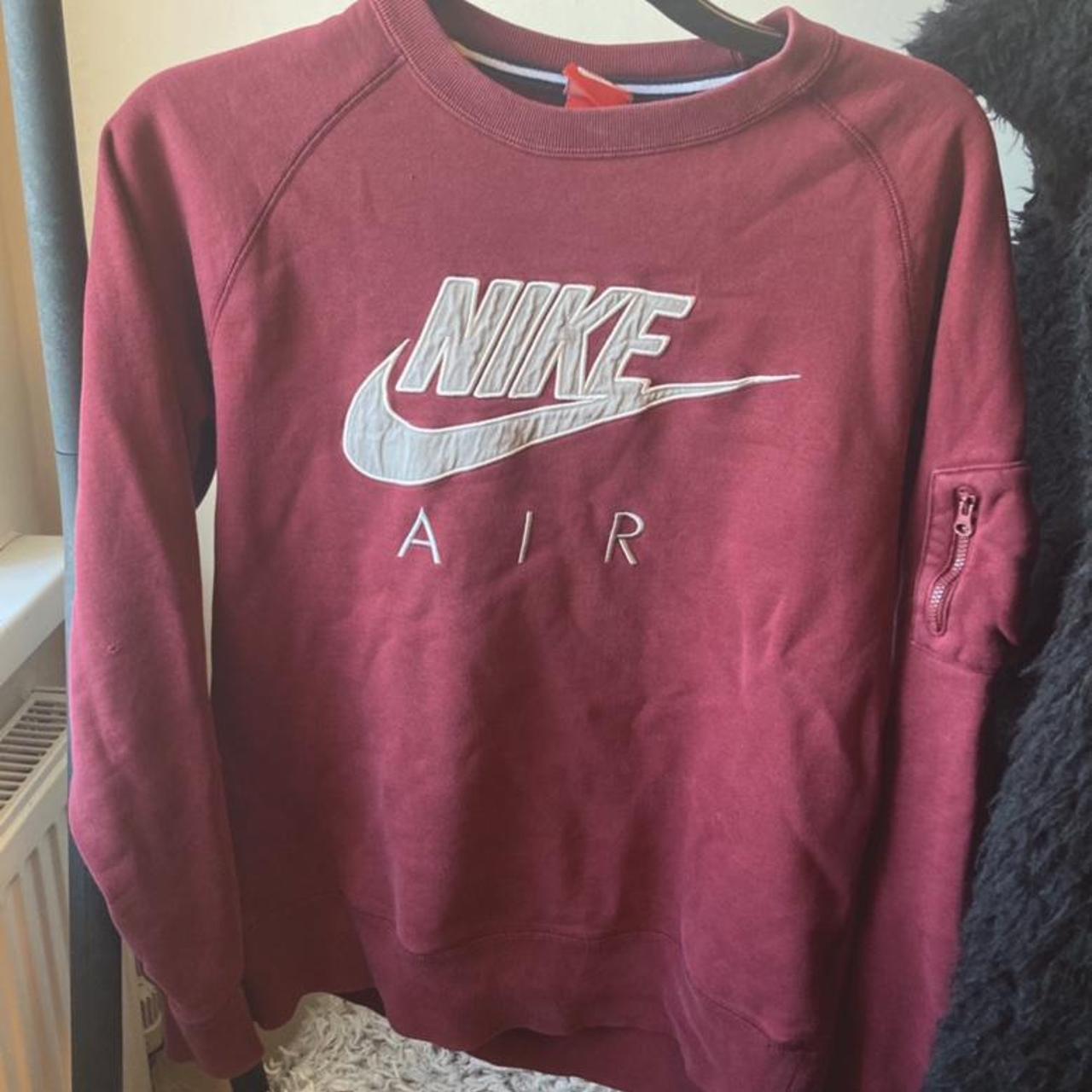 Nike crew neck jumper size medium with arm pocket... - Depop