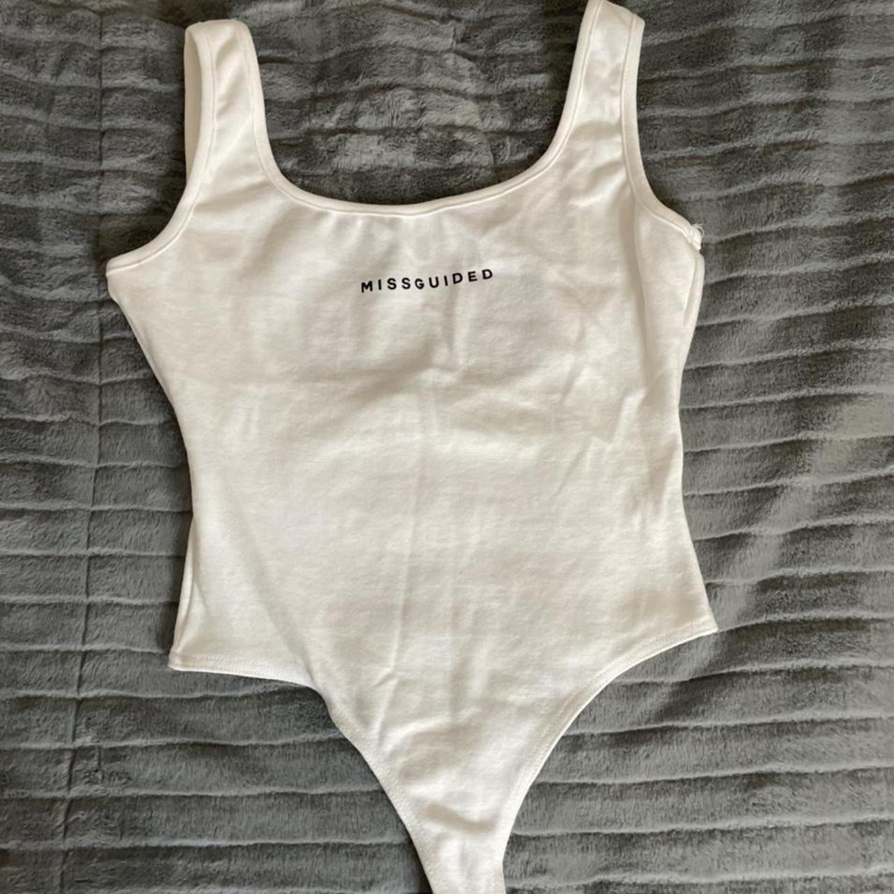 Missguided Logo Low Back Bodysuit in White BARELY... - Depop