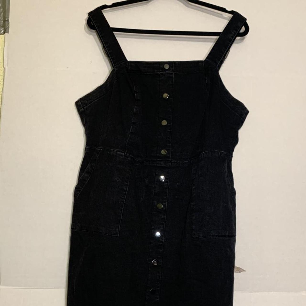 Black overall dress Has a slit in the back, sort of... - Depop