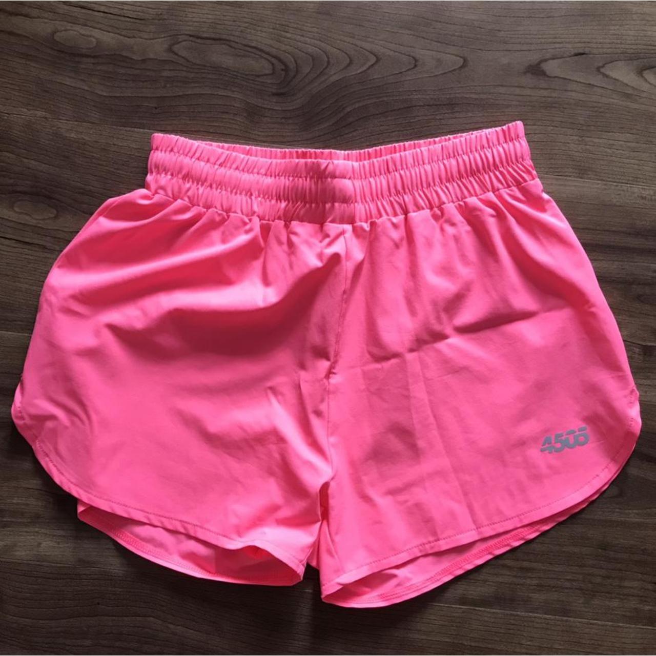 Bright pink Sports shorts. Its a size 6/8. Barely... - Depop