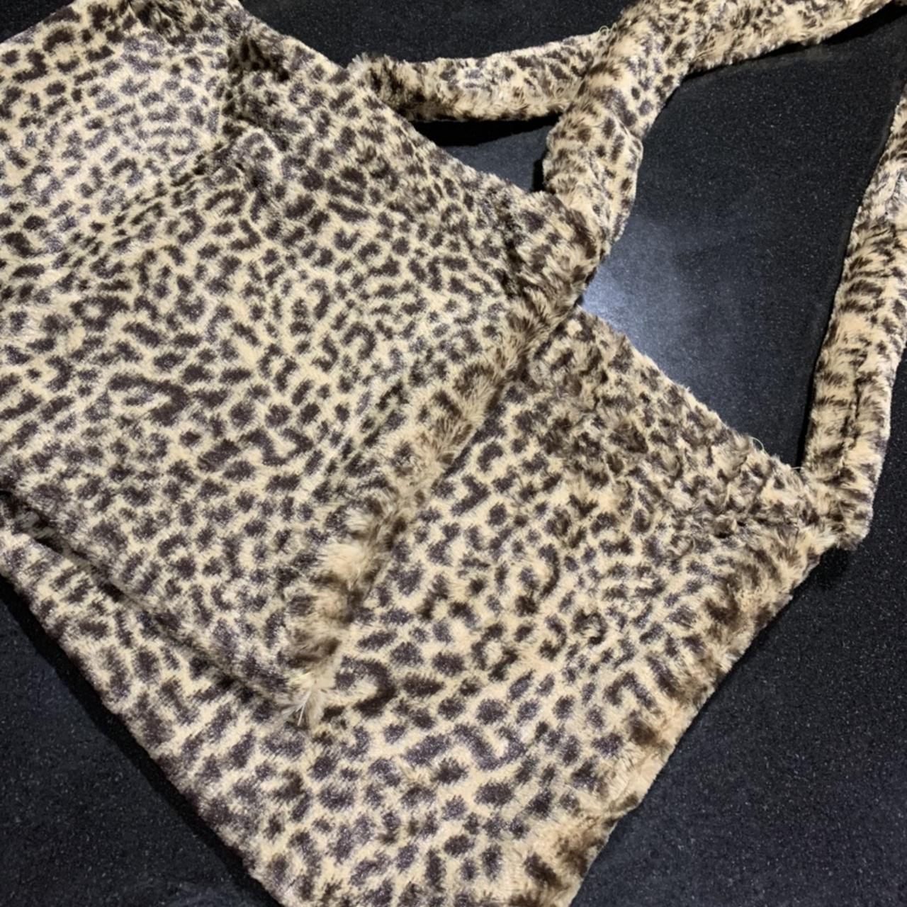 faux fur fuzzy cheetah/ leopard print bag... - Depop