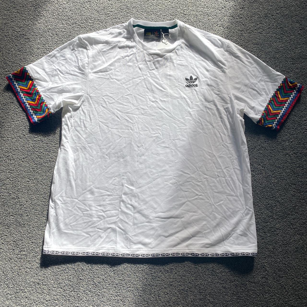 MENS ADIDAS PHARRELL WILLIAMS TREFOIL TEE WHITE... - Depop