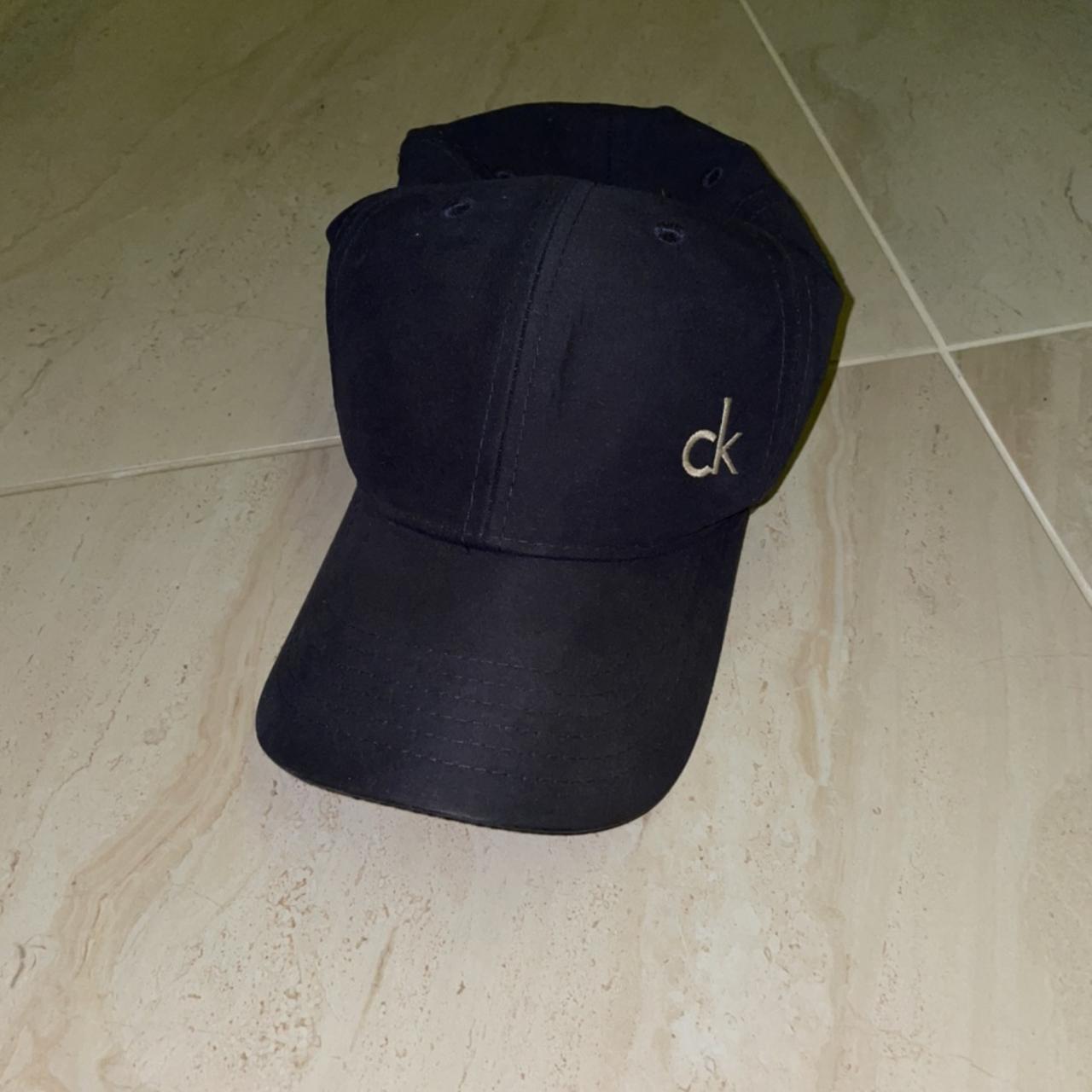 Calvin Klein Cap -one size -navy -slight fading... - Depop