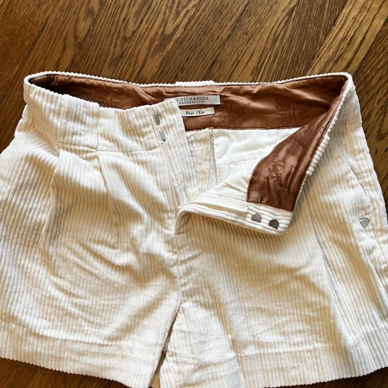 Cream colored corduroy shorts with a subtle pleating... - Depop