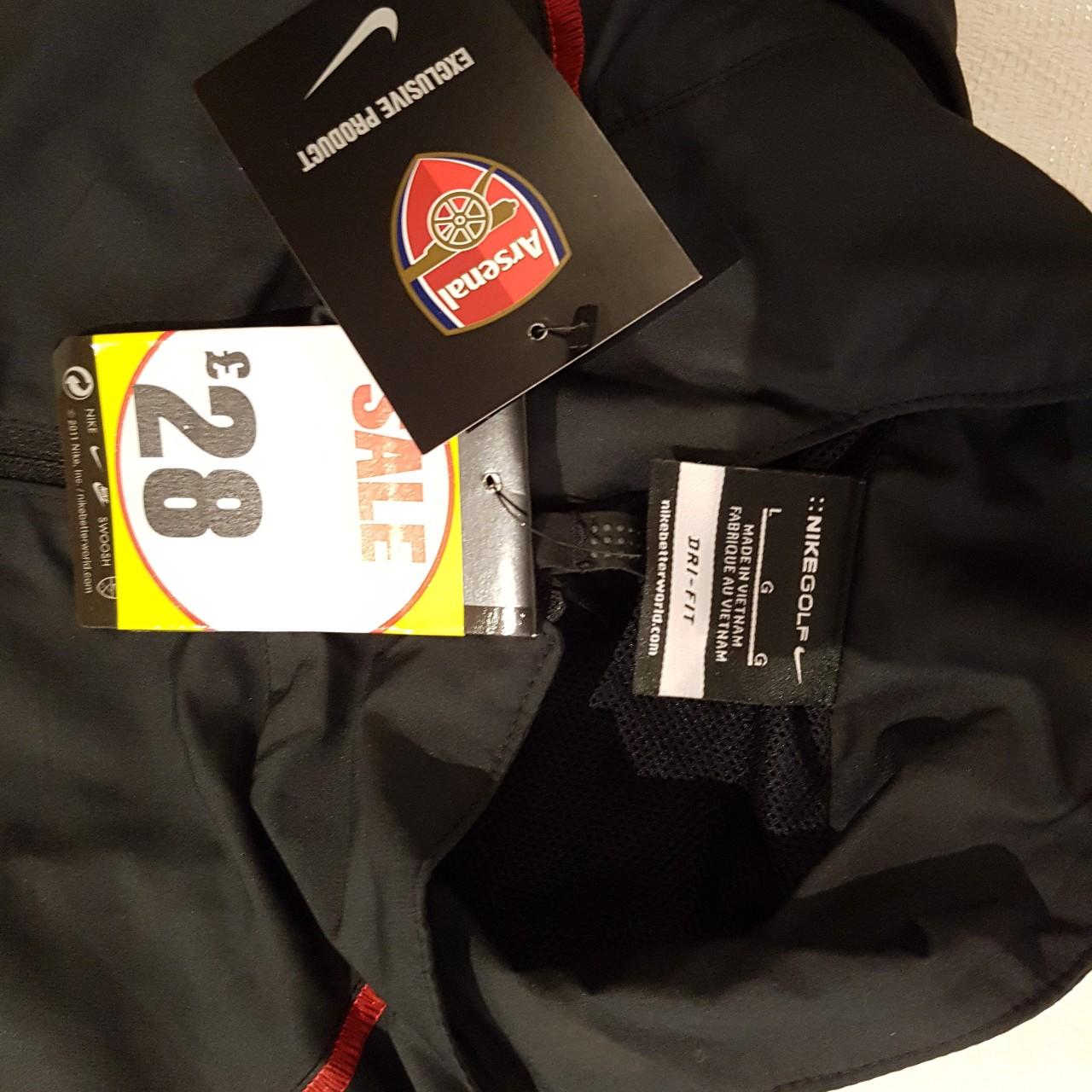 Arsenal rain coat never been worn but overall in... - Depop