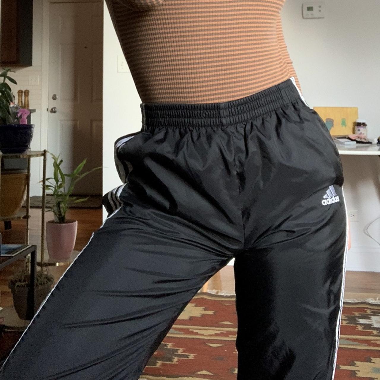 Vintage black adidas tear off track pants. Size boys... | Depop