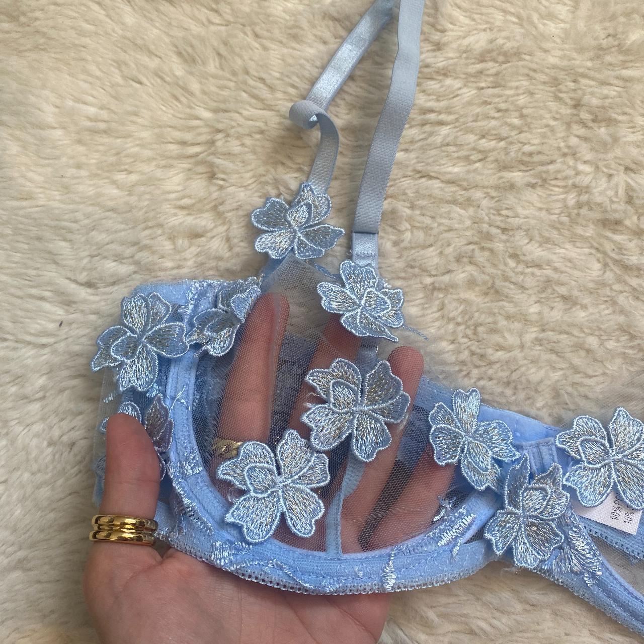 Blue lace, flower bra and panties set. Never worn... - Depop