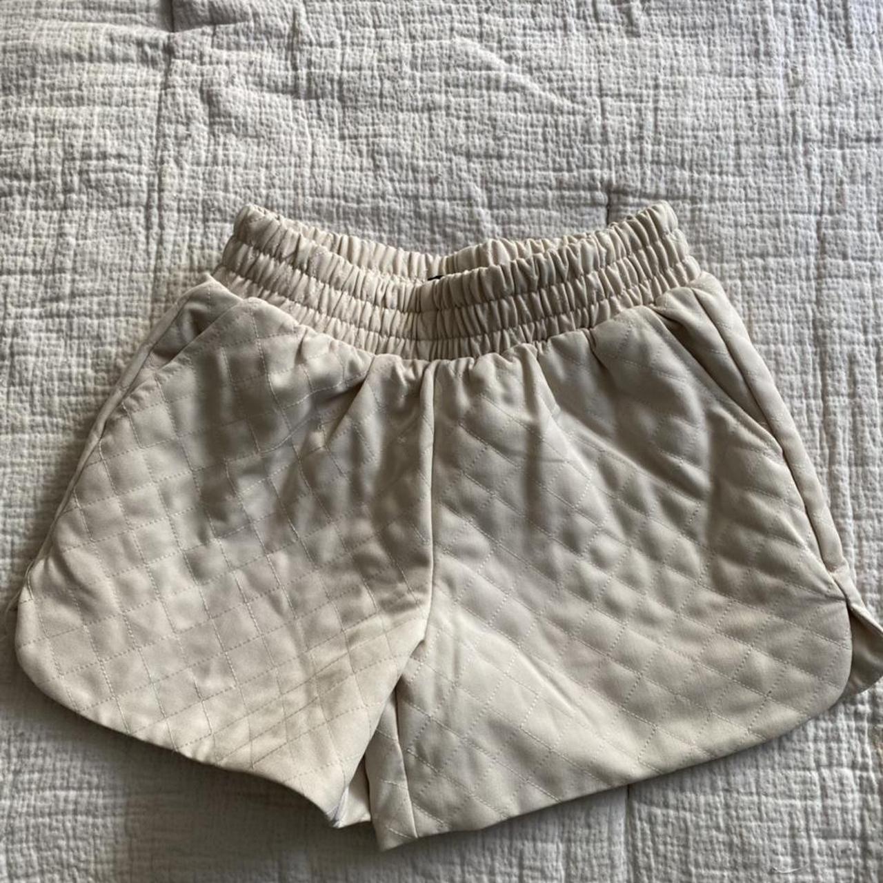 tan shorts . unique style. has pocket. would match a... - Depop