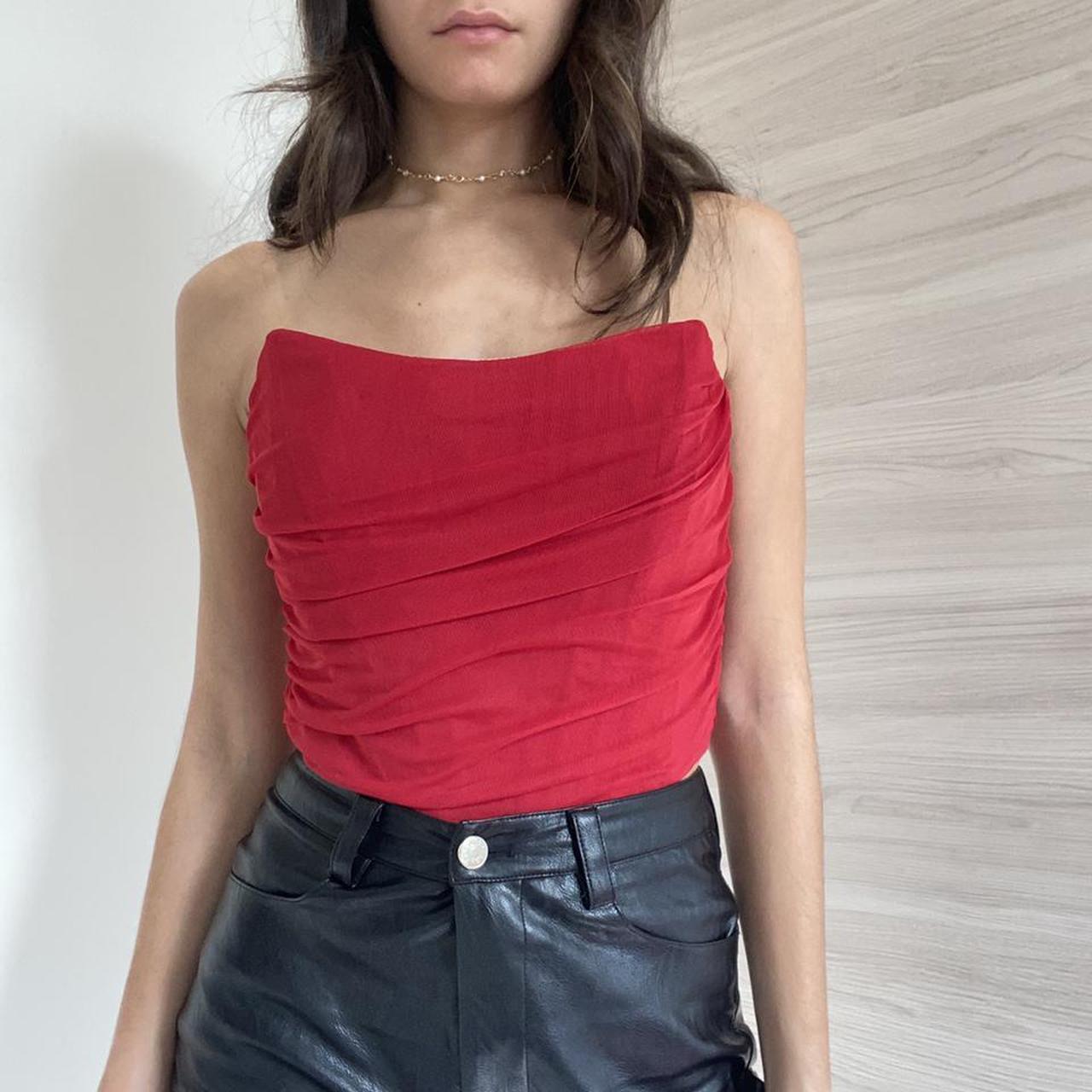 Red corset top. It zips up on the back and creates a... - Depop