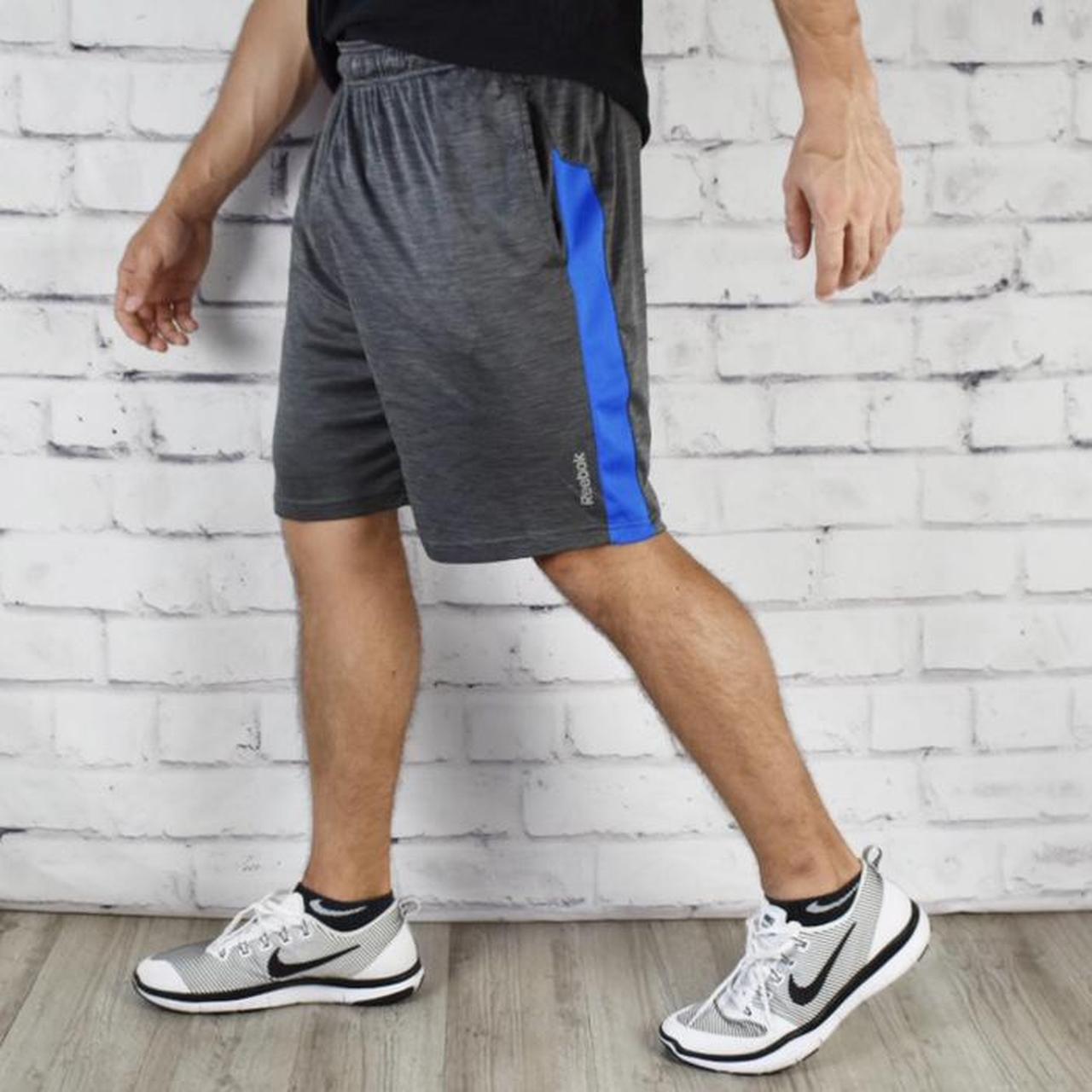 Reebok Graphite Heather and Electric Blue Athletic... - Depop