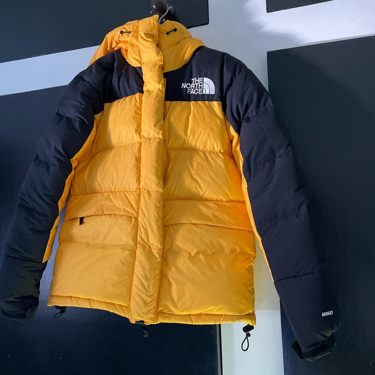 North face 550 Yellow hooded jacket size Small for... - Depop