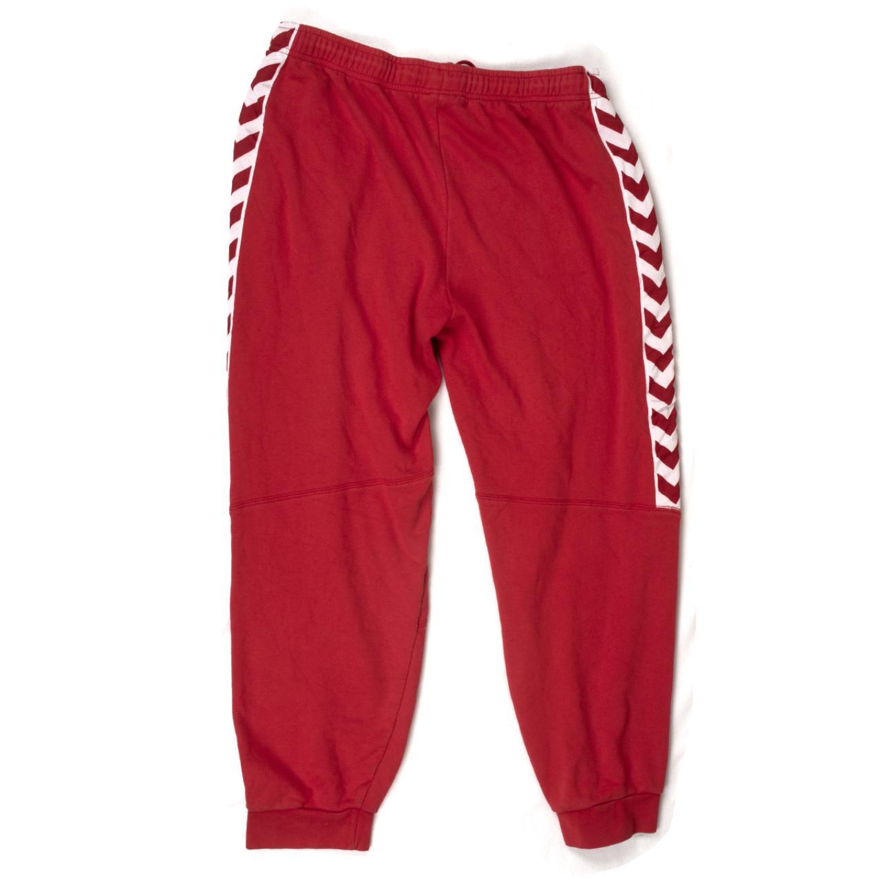 Hummel transuit pants with arrow panels to... - Depop