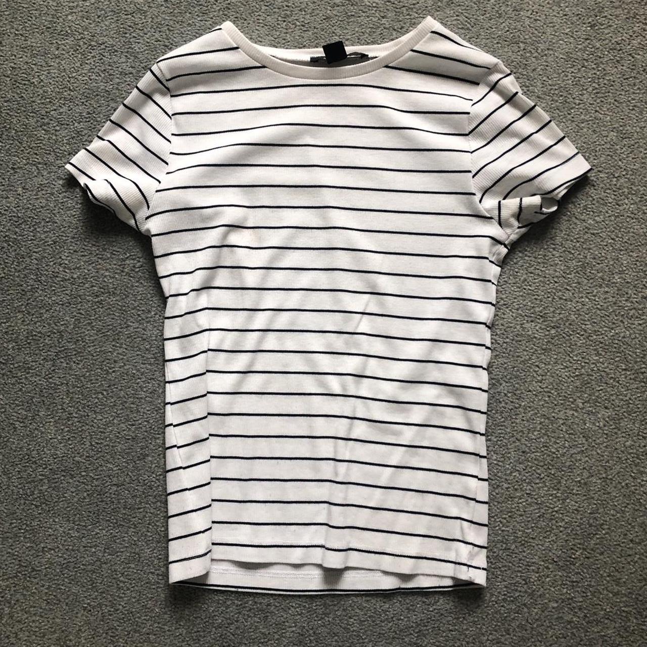 White ribbed tshirt with black stripes, fits pretty... - Depop