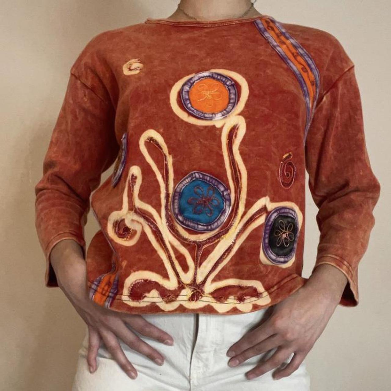 studio orange tee with cool bleach effect and design... - Depop