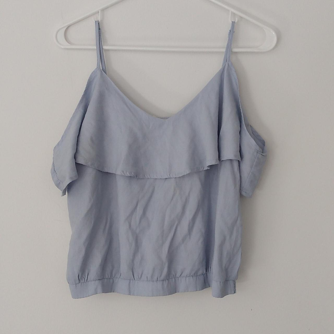 Adorable baby blue crop top with flowy neck line.... - Depop