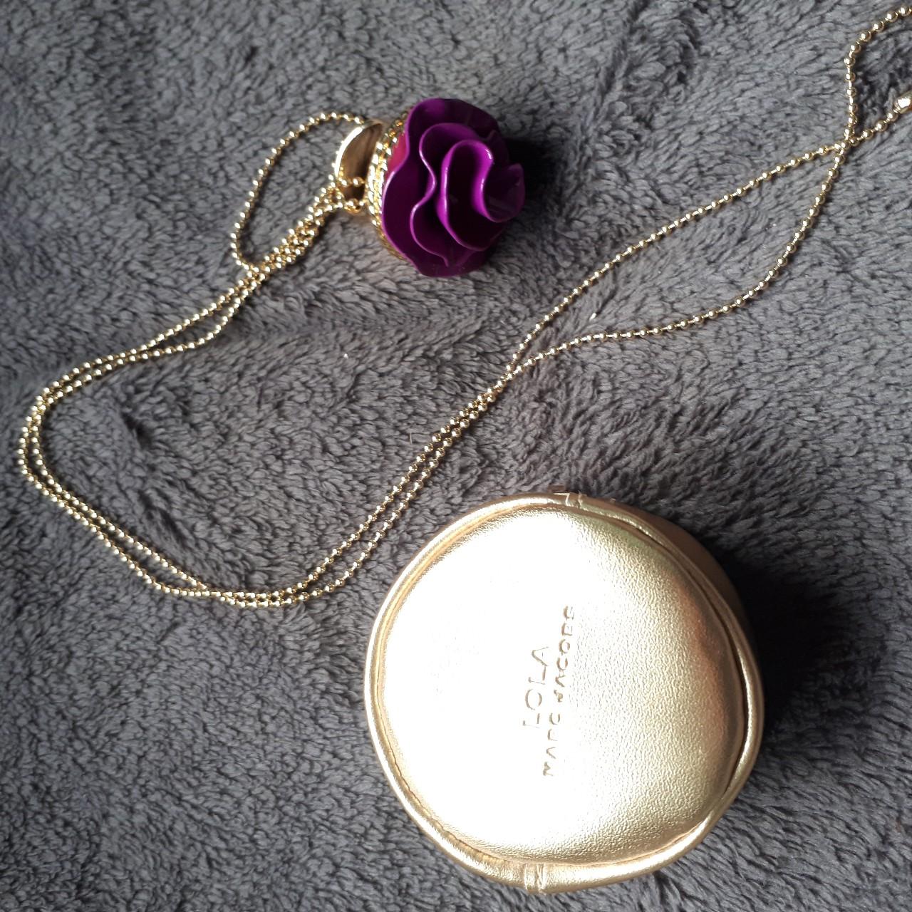 Marc Jacobs Lola solid perfume necklace in a gold... - Depop