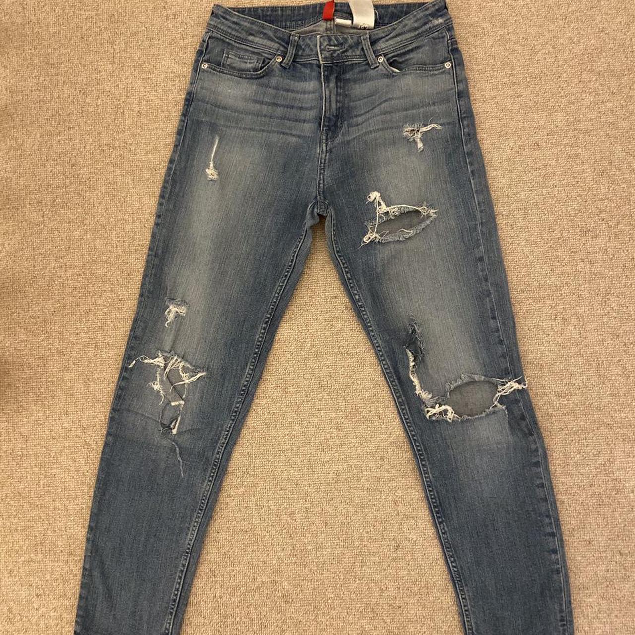Gorgeous distressed H&M jeans with rips down the... - Depop