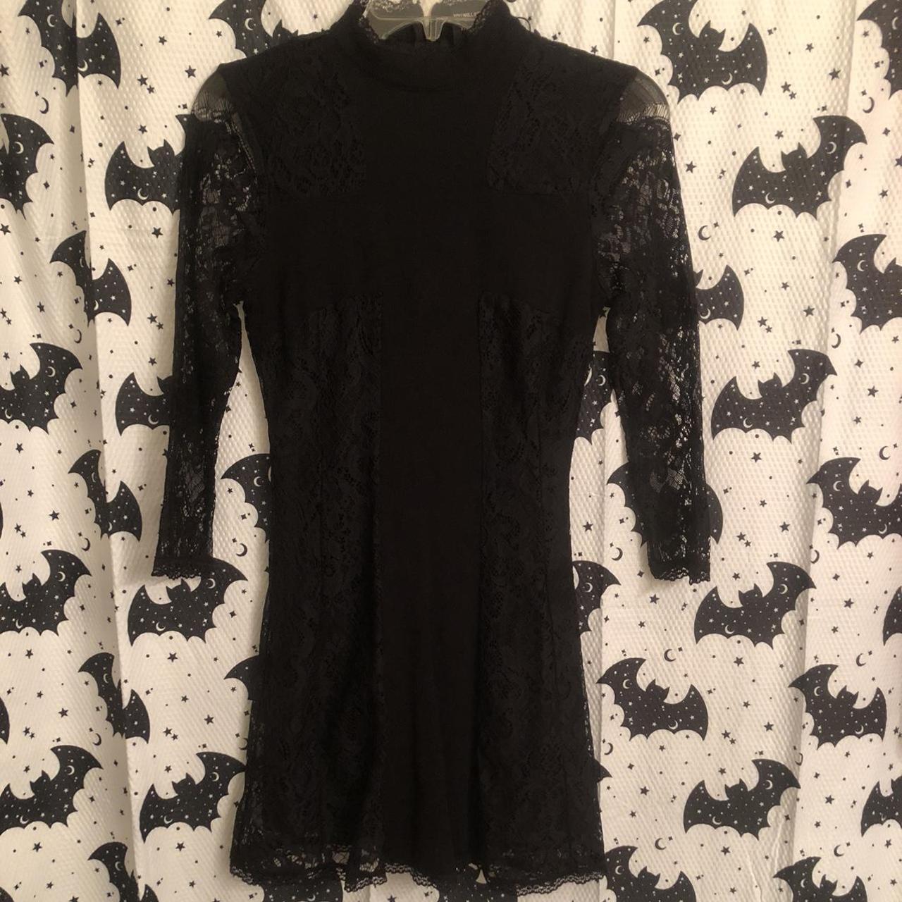 Beautiful black lace dress with cross in center by... - Depop