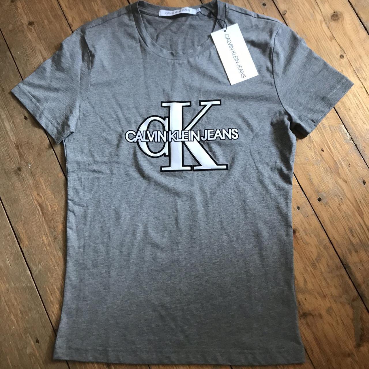 Grey Calvin Klein jeans t-shirt Brand new with... - Depop