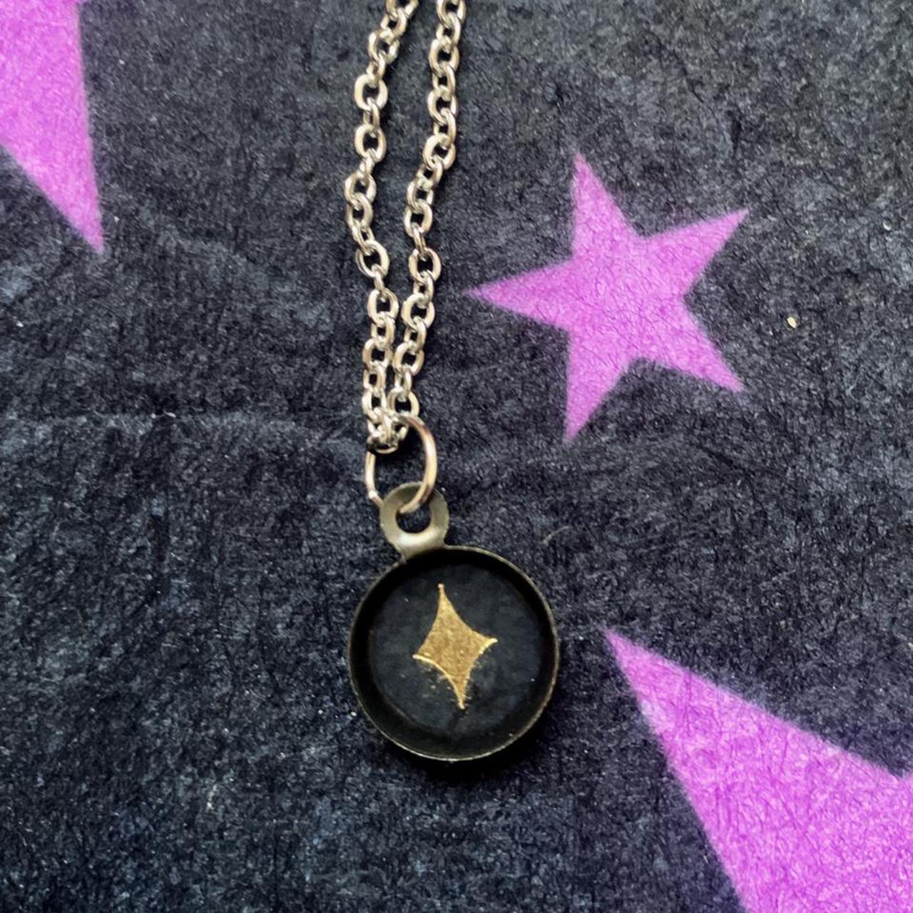 Star resin necklace with silver chain #star... - Depop