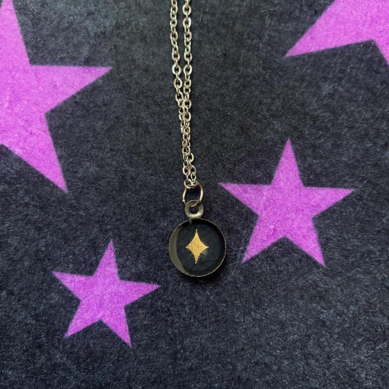 Star resin necklace with silver chain #star... - Depop