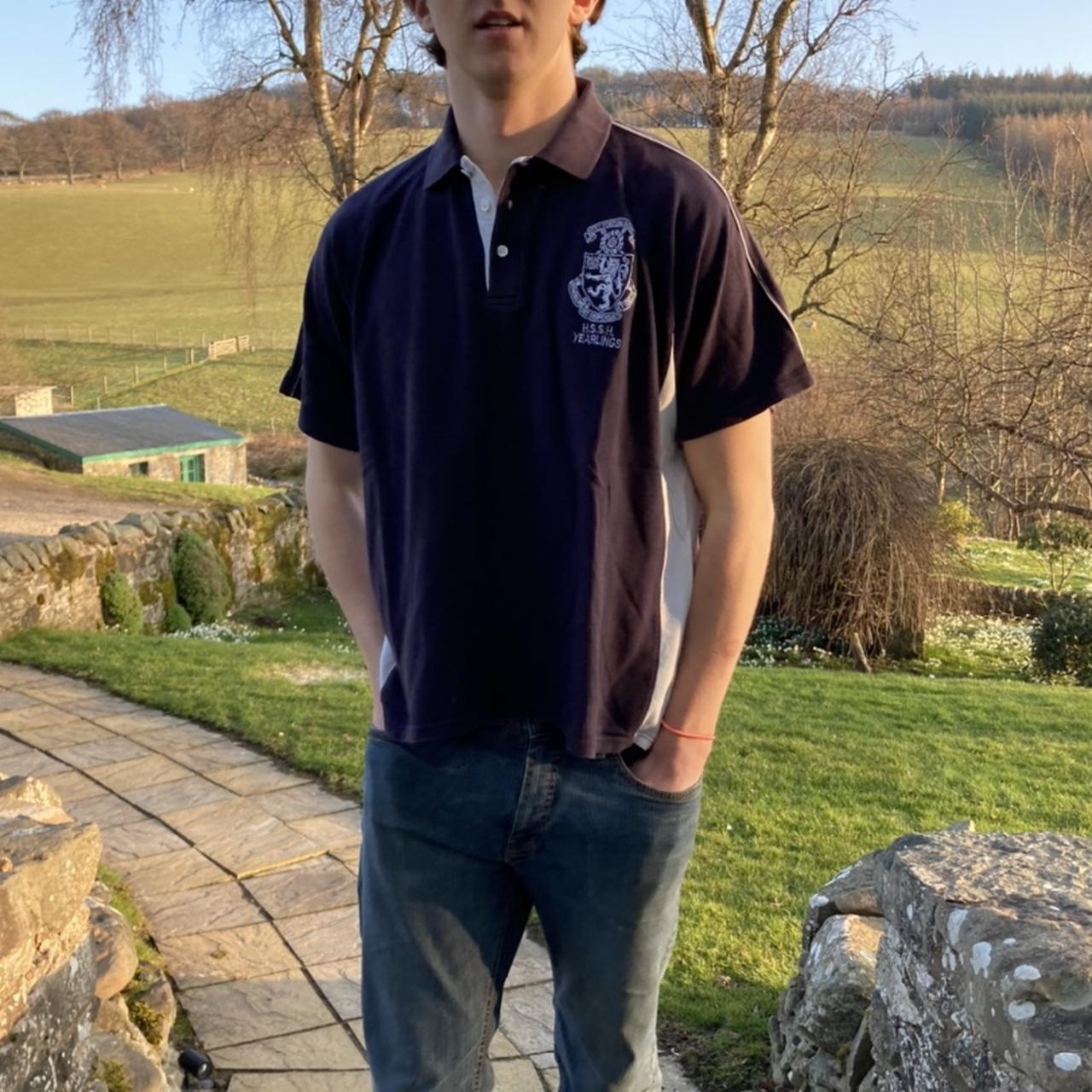 Men’s navy and white rugby shirt. Has white stripes... - Depop