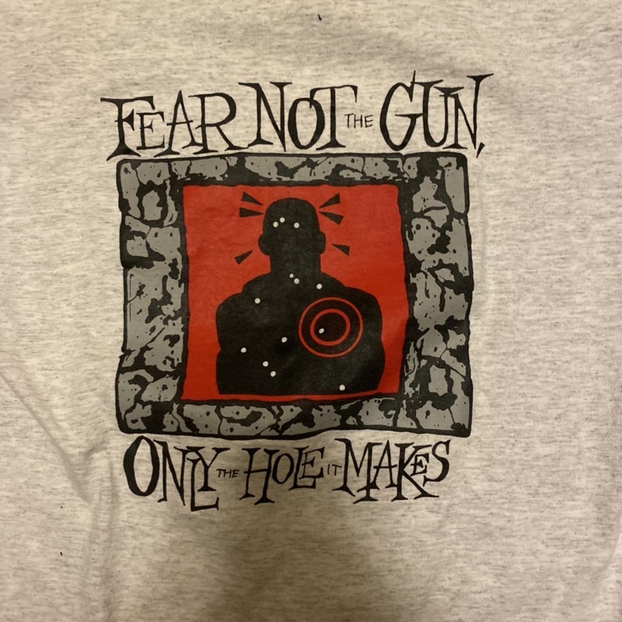 Fear Not The Gun Only The Hole It Makes Tee It’s... - Depop