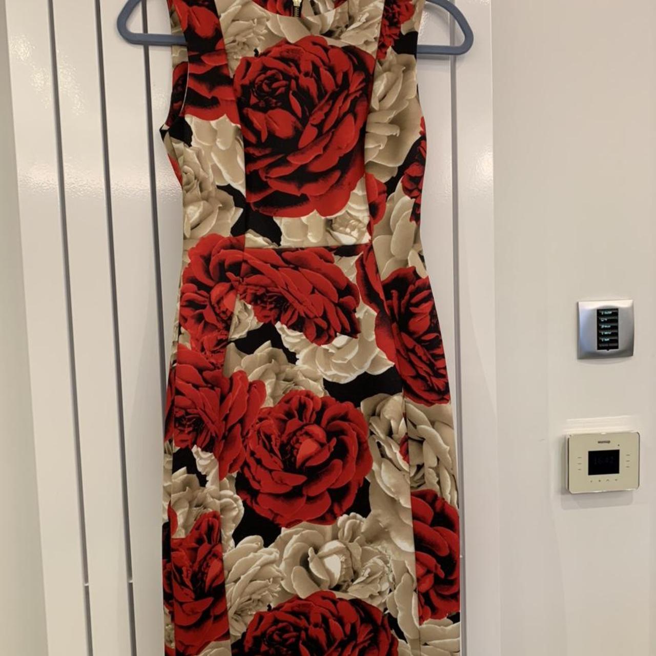 Calvin Klein Gorgeous fitted dress with Rose design.... - Depop