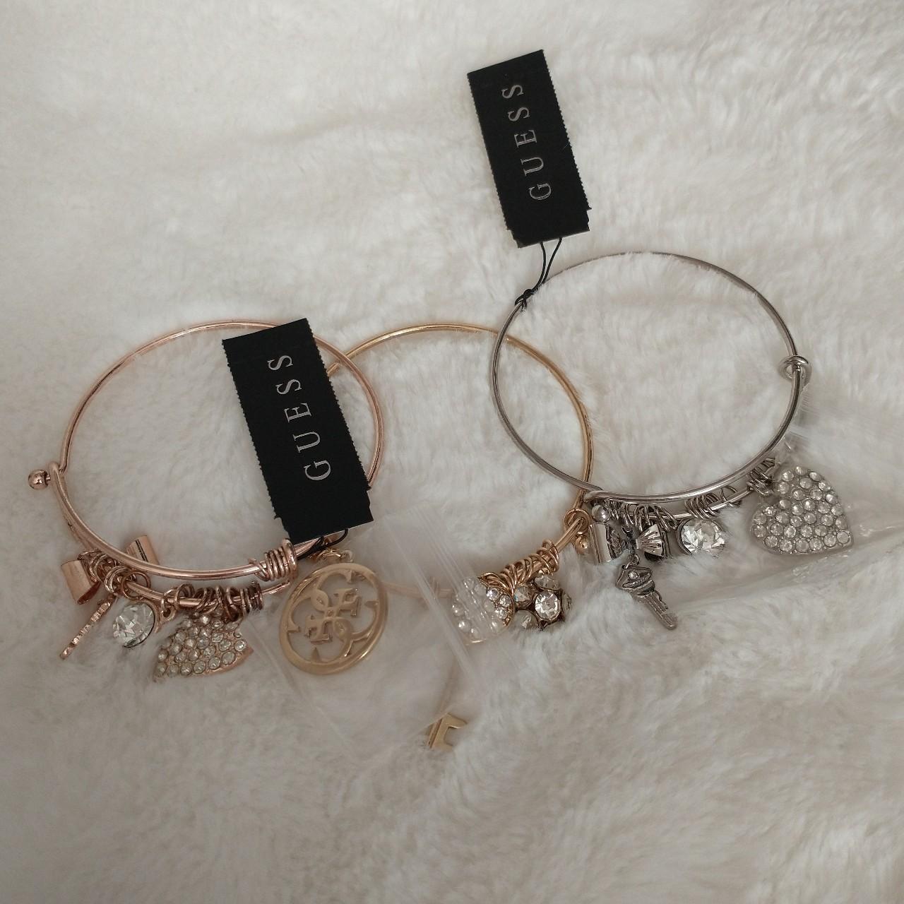 SET OF 3 Guess charm bracelets (gold, copper,... - Depop