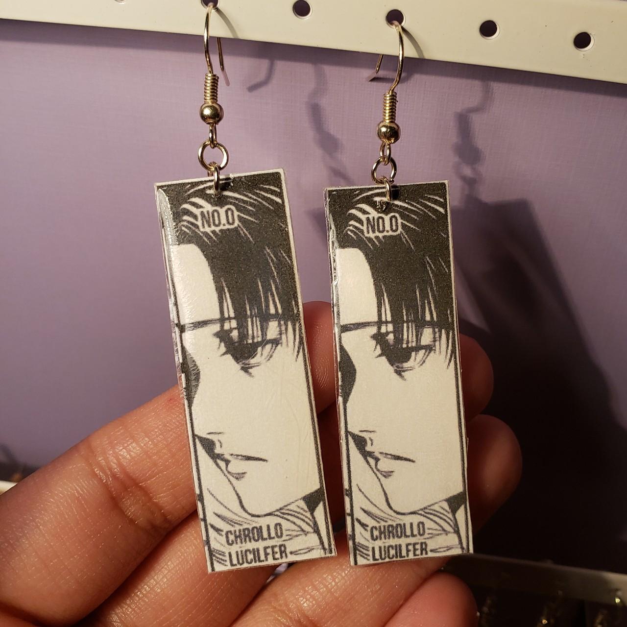 These are hunter x hunter earrings of Chrollo... - Depop