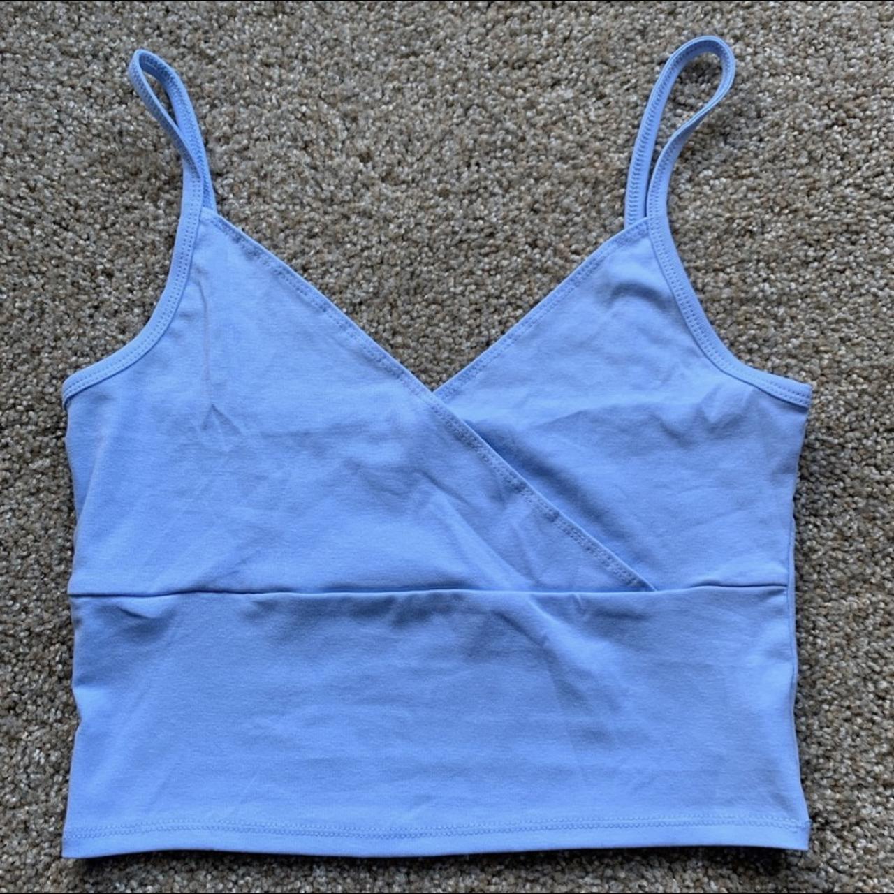 light blue tank top similar to the amara tanks from... - Depop