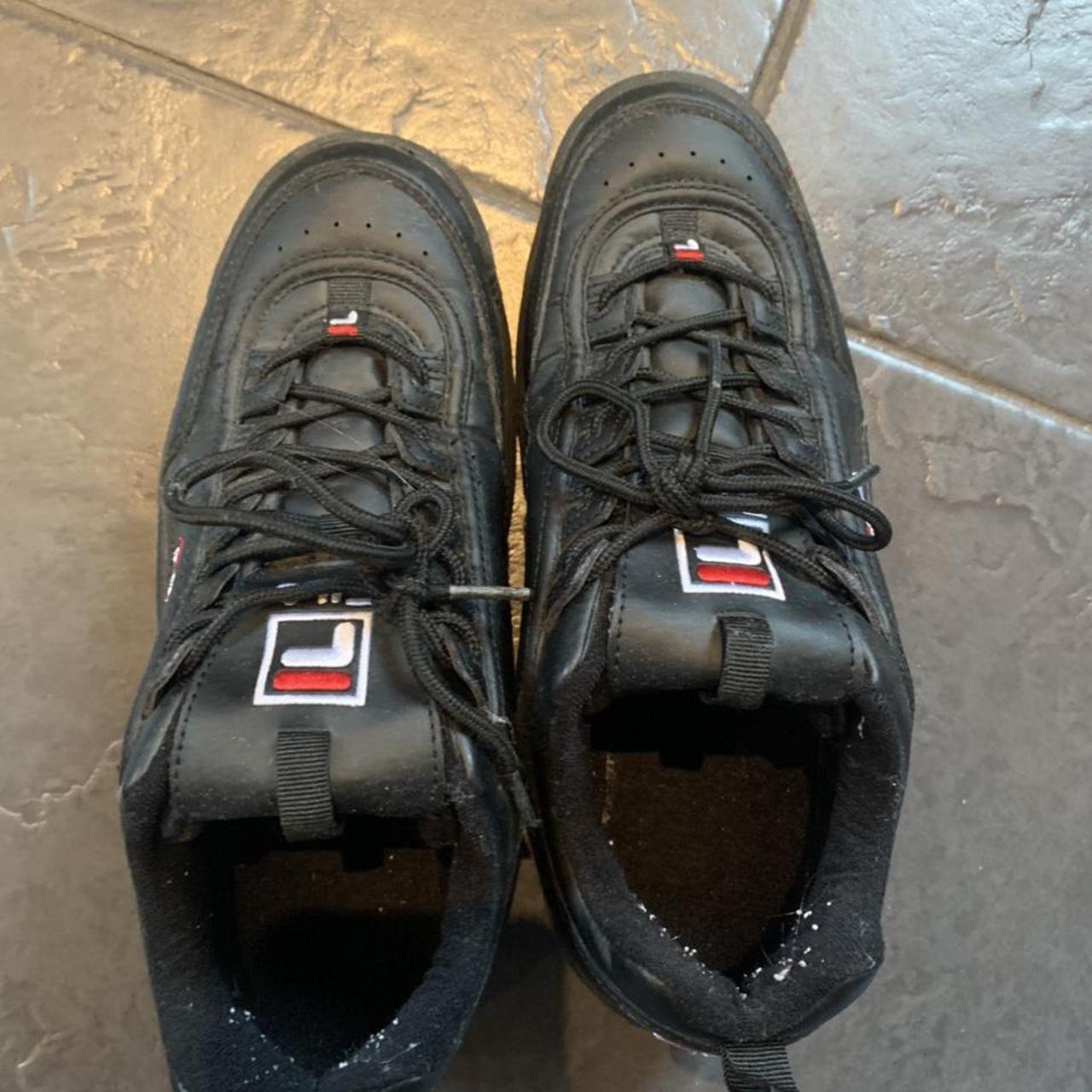 Fila Women's Black and Red Trainers | Depop