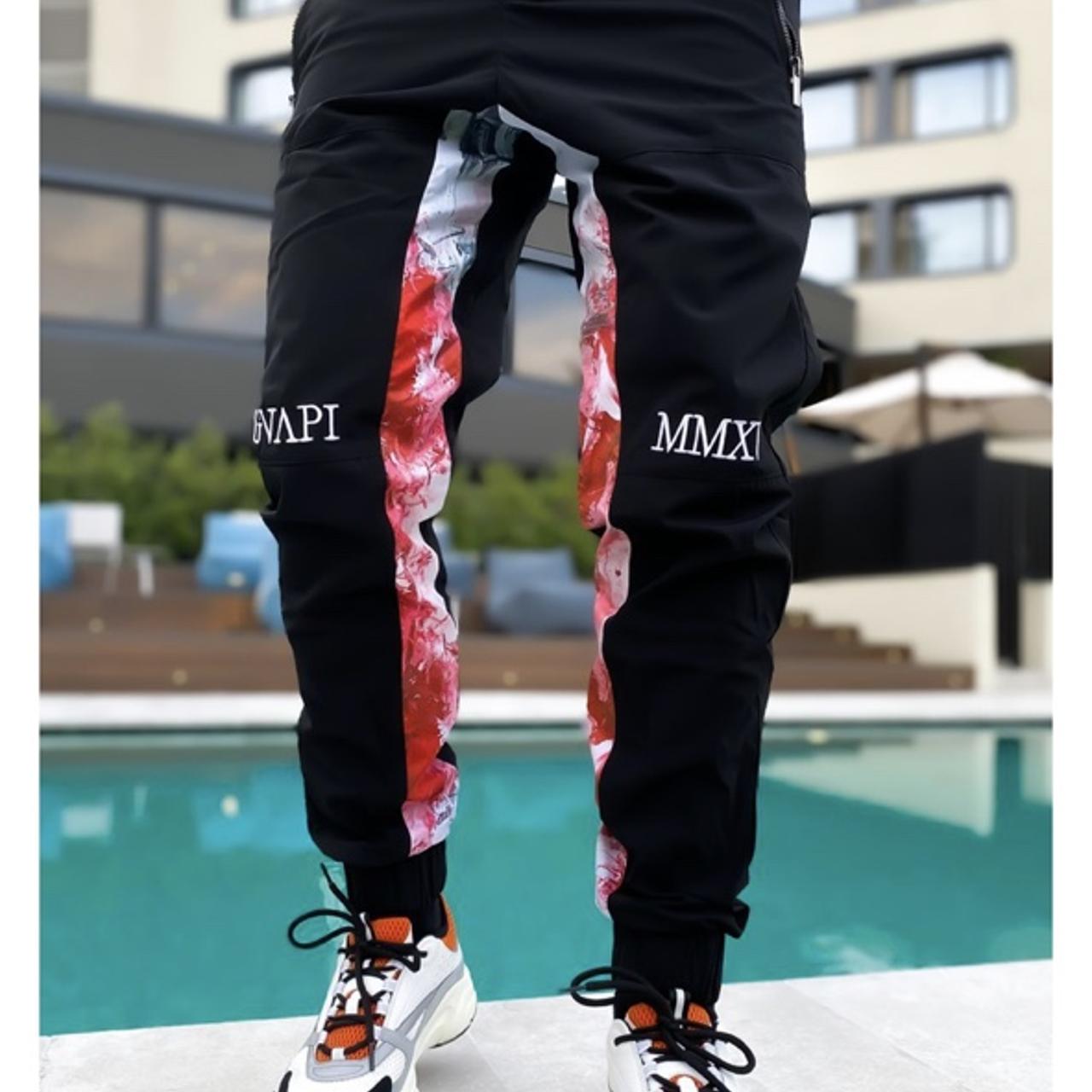 Guapi red Morden art track pants I’m Looking to buy... - Depop