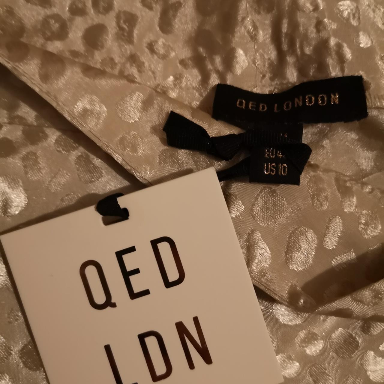 QED Gold skirt Shiny fabric Size 14 Brand new with... - Depop