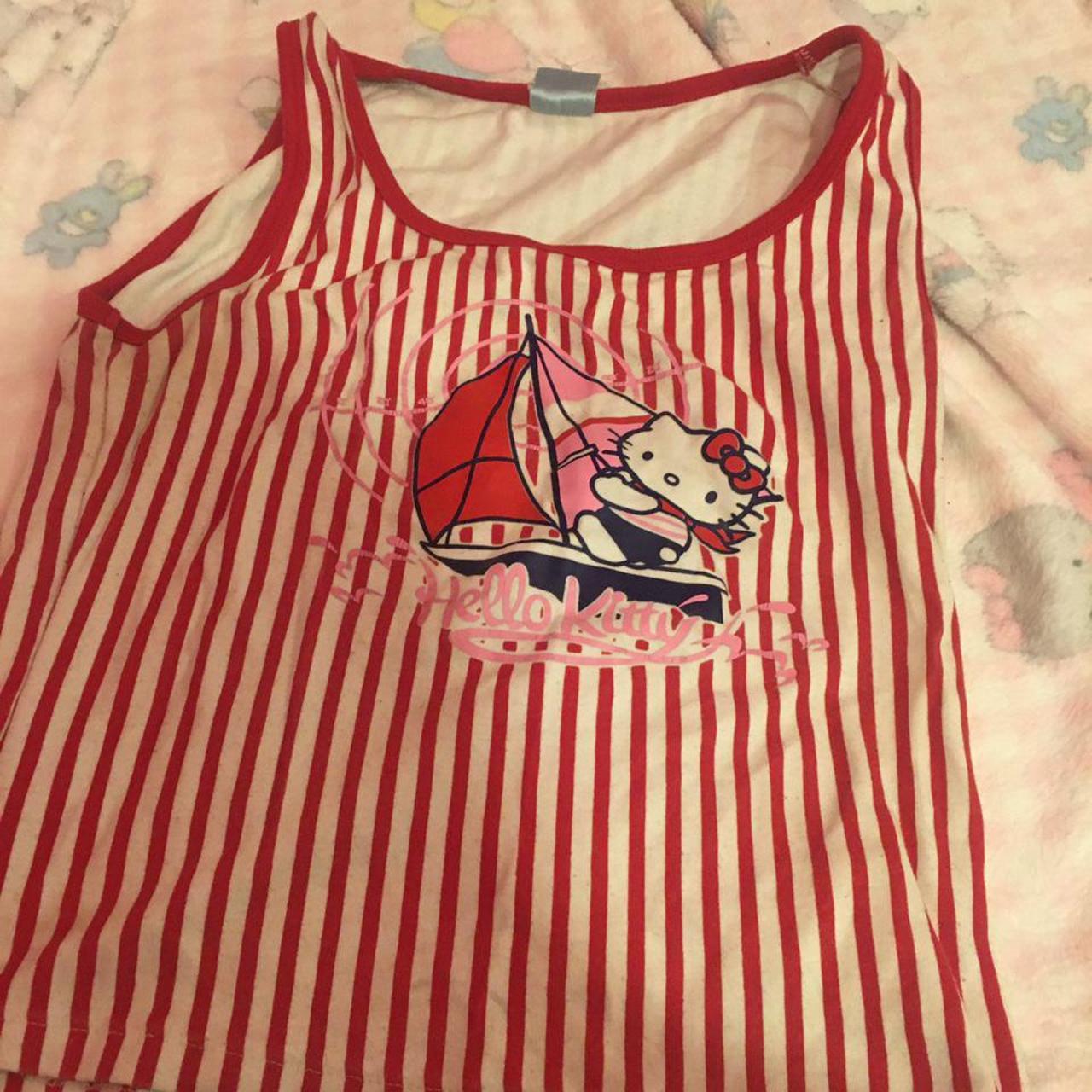 Hello kitty sailing tank top! Tag says Large but... - Depop