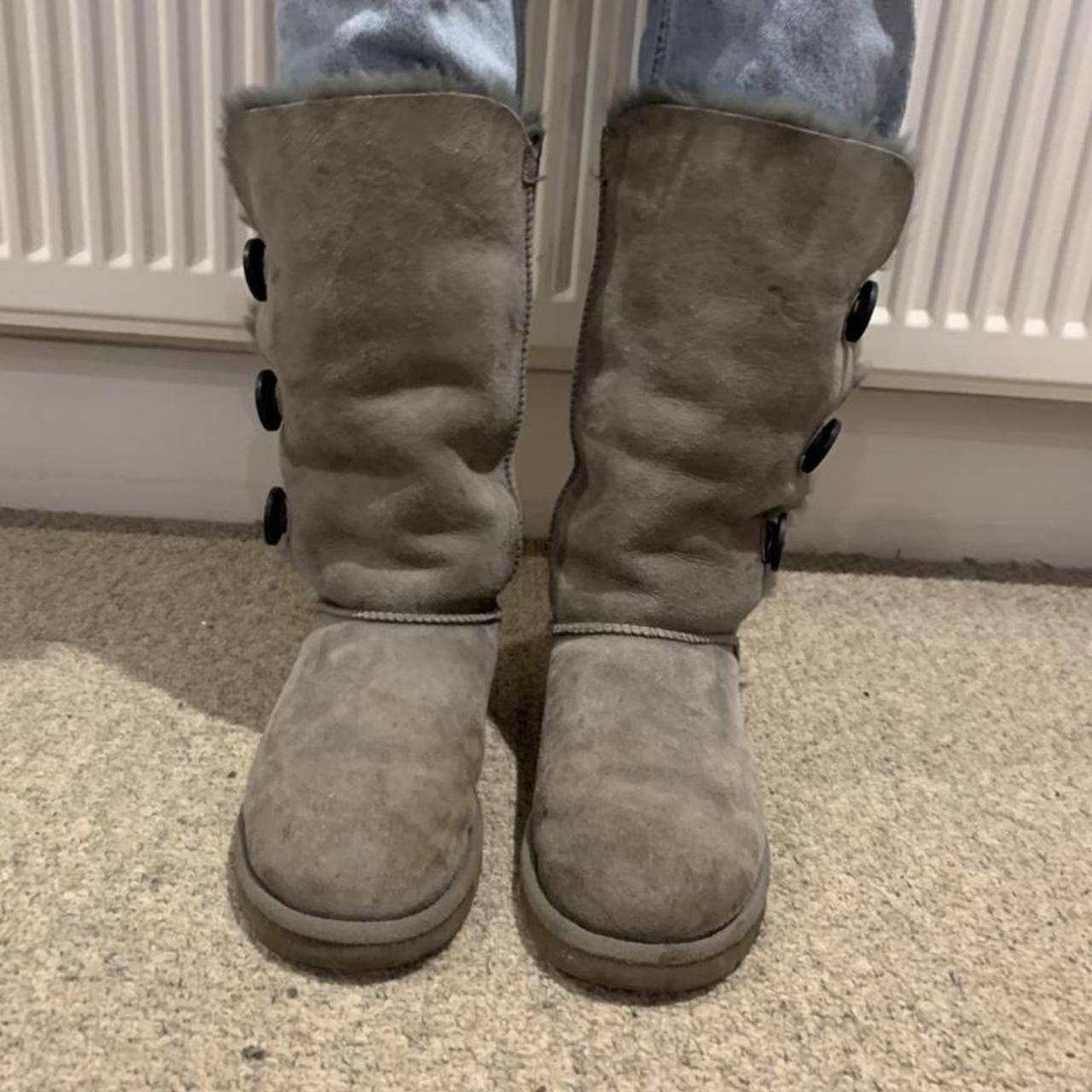 grey ugg boots with buttons up the side. slightly... - Depop