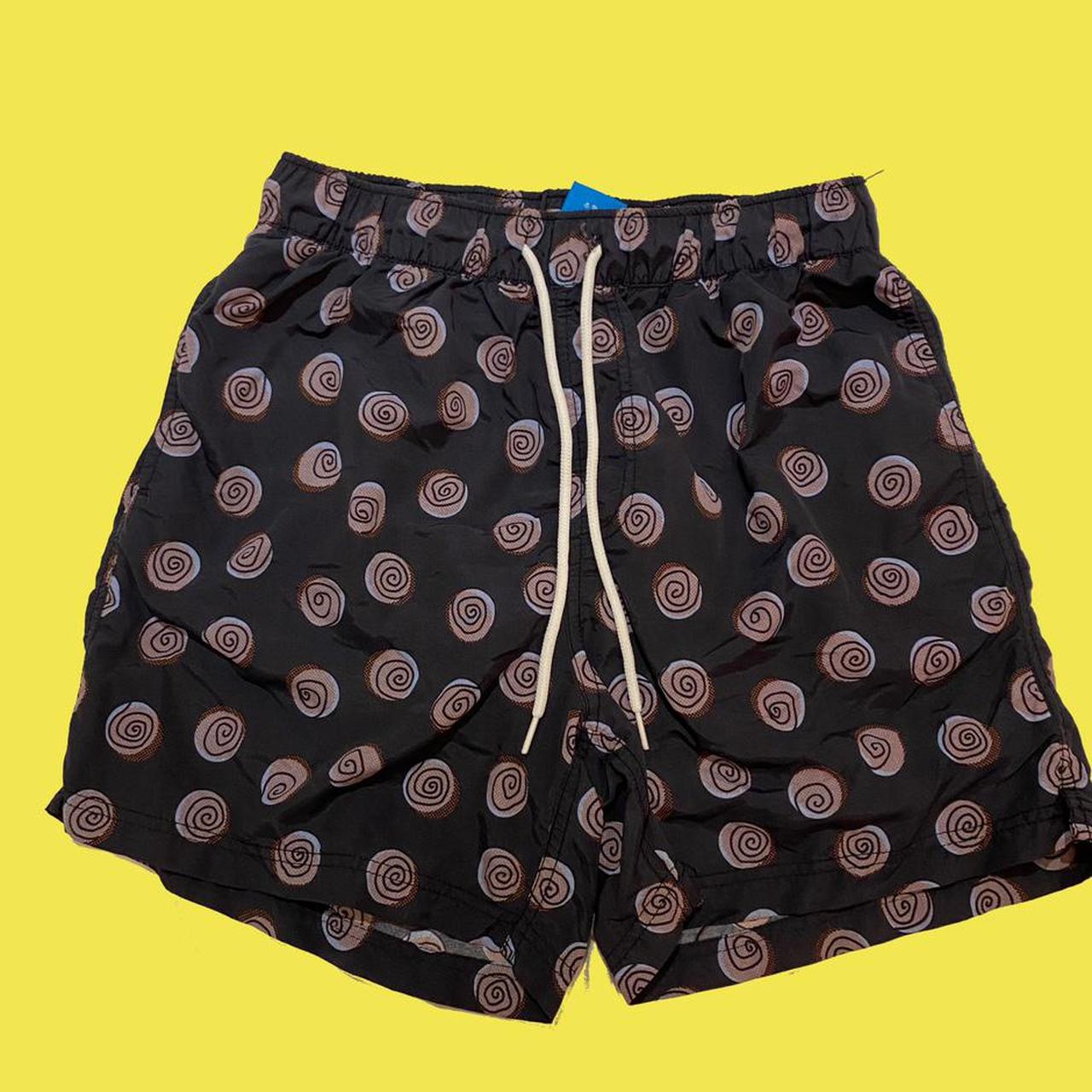 navy blue Urban Outfitters swim trunks with spiral... - Depop