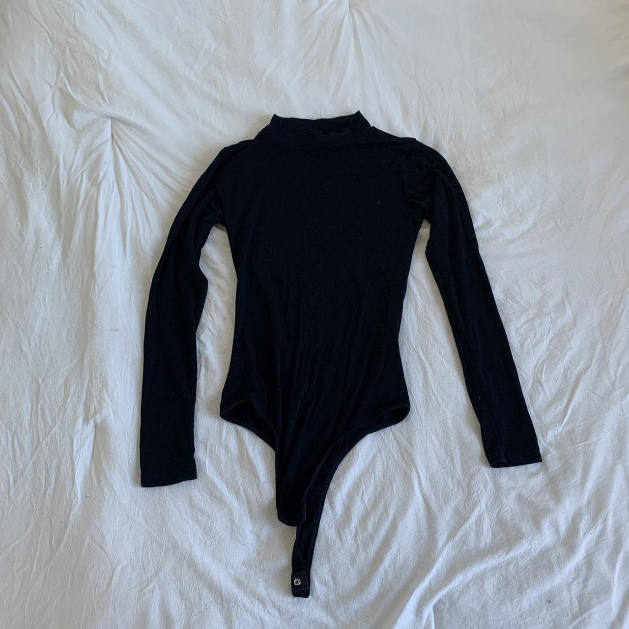 Francesca’s black turtle neck body suit -size... - Depop