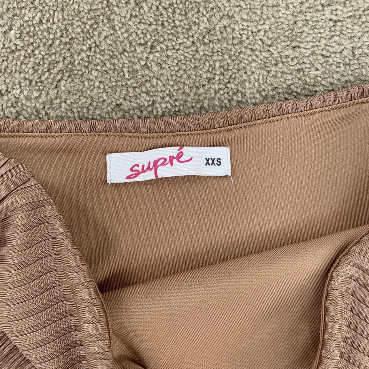 Cute boob tube from supre. it’s a shiny pink... - Depop