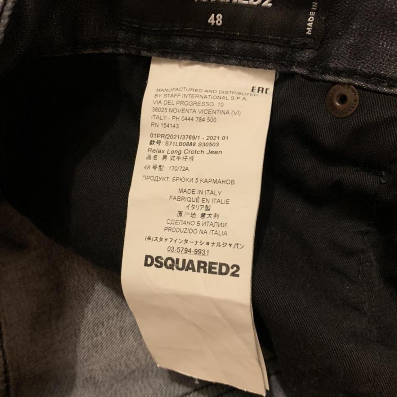 Mens black with yellow paint splatter Dsquared jeans... - Depop