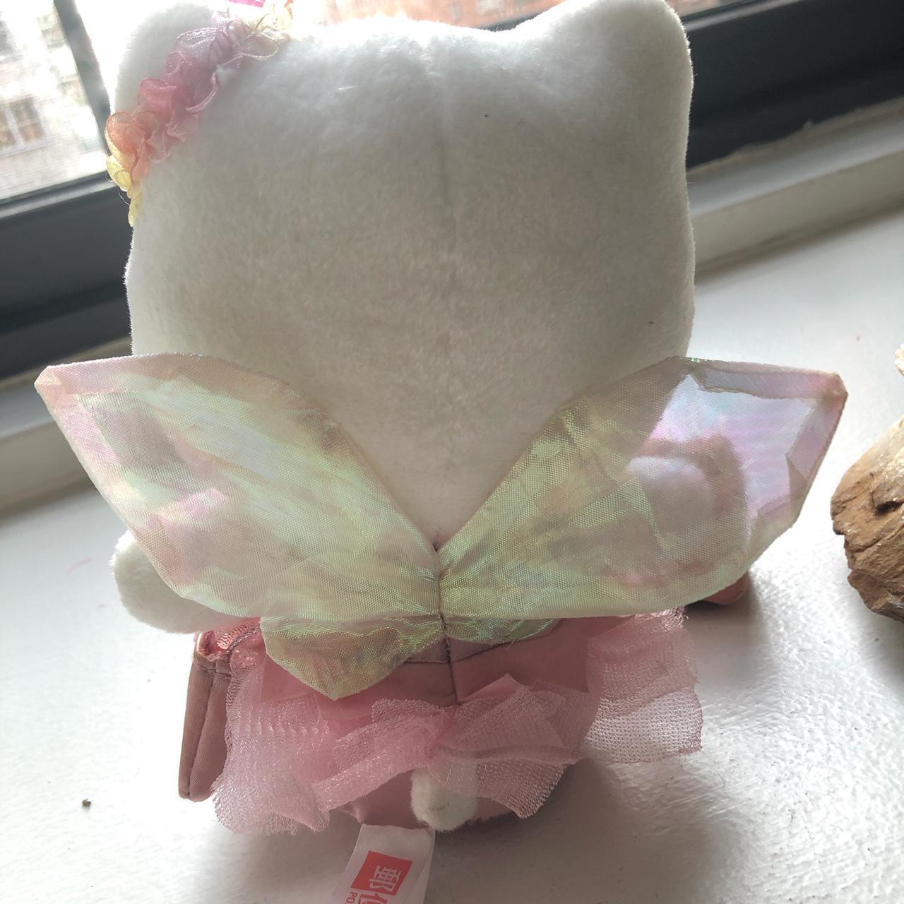 Mailman fairy hello kitty 🧚‍♀️ -holding a messenger... - Depop