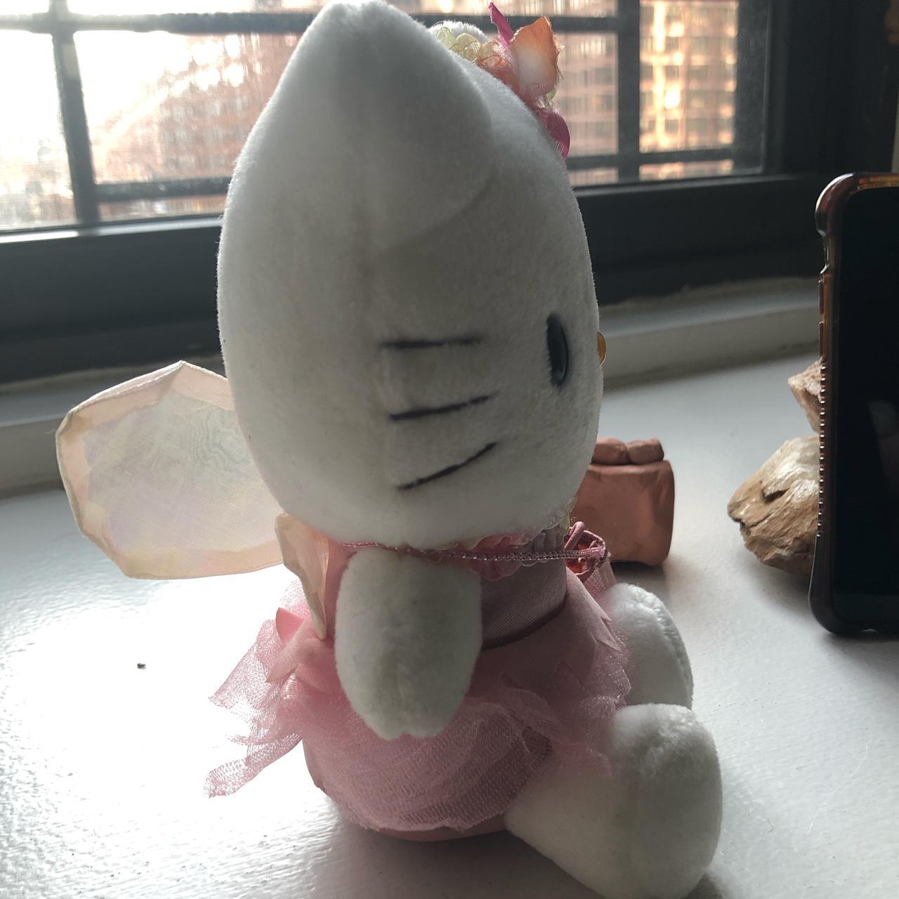 Mailman fairy hello kitty 🧚‍♀️ -holding a messenger... - Depop