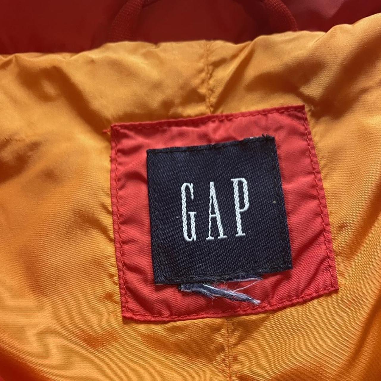 GAP red sleeveless puffer jacket. Size tag has been... - Depop