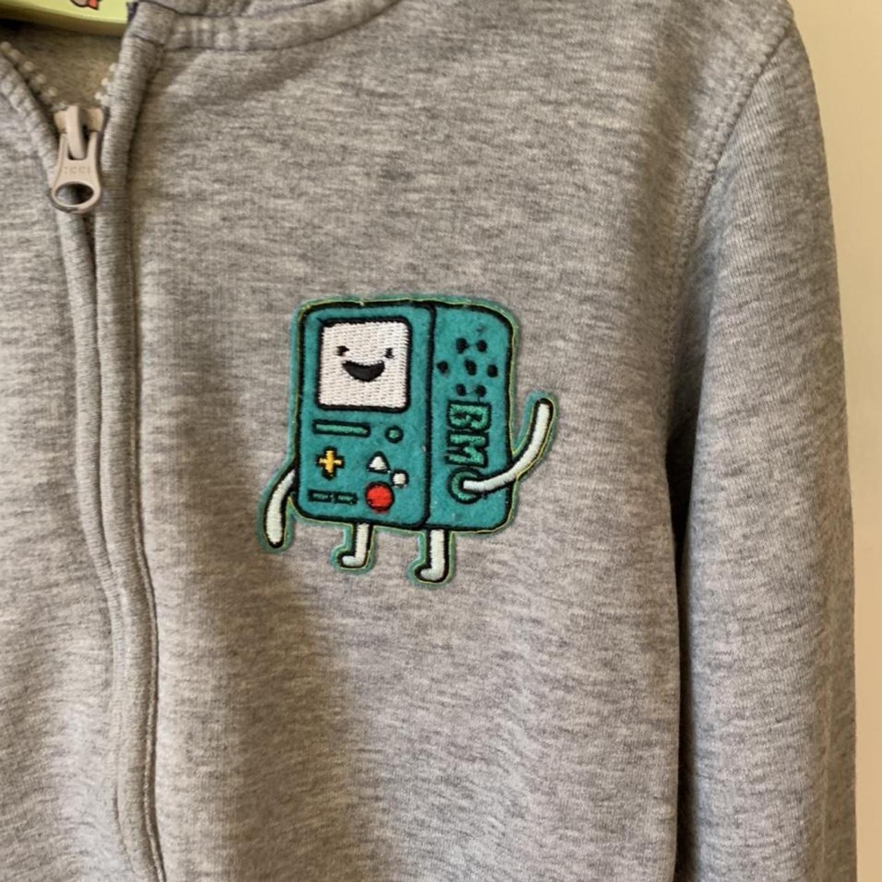 BMO kids zipped hoodie. It’s a BMO patch ironed... - Depop
